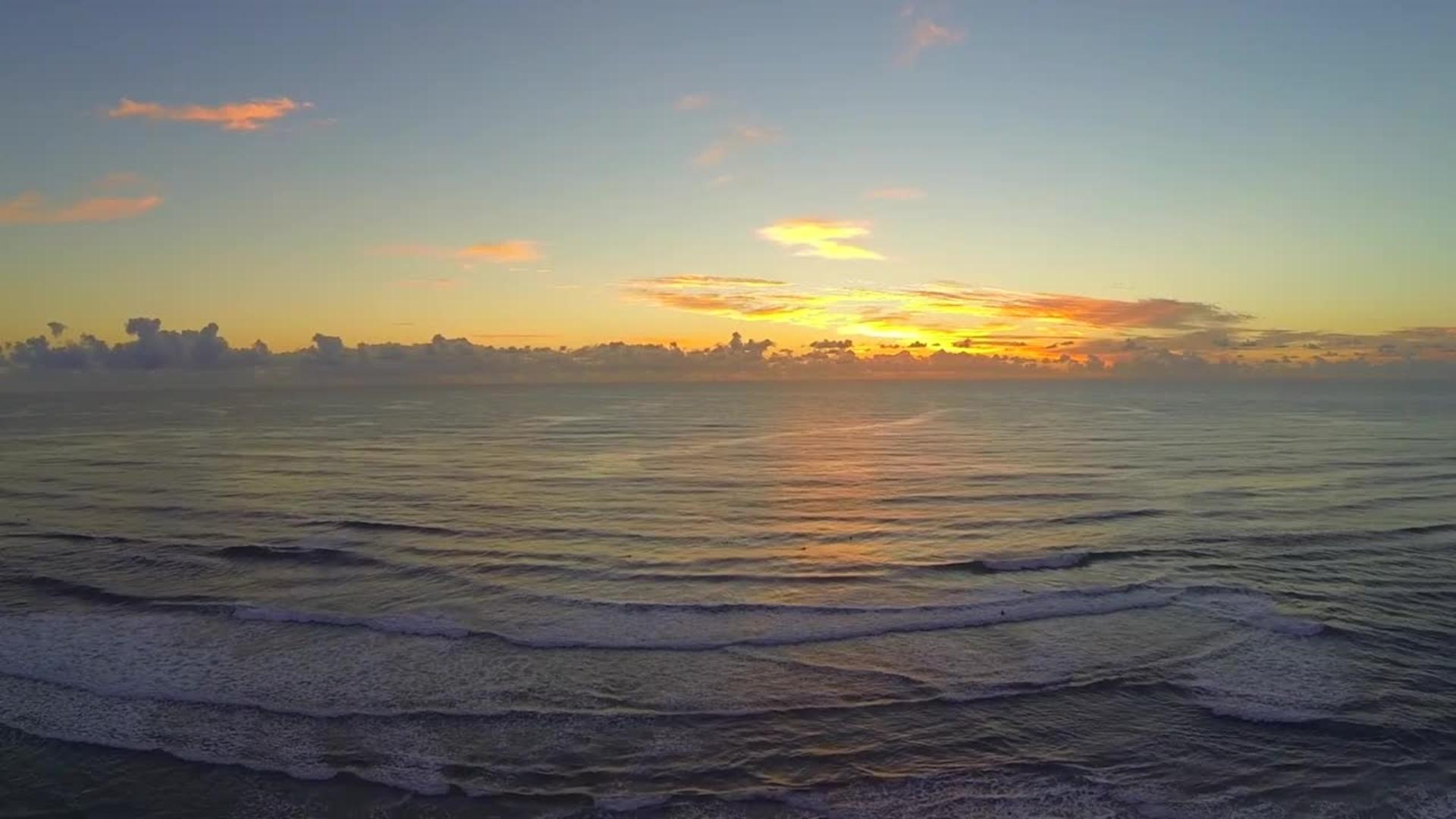Surfing During Golden Hour in Miami | Jukin Licensing