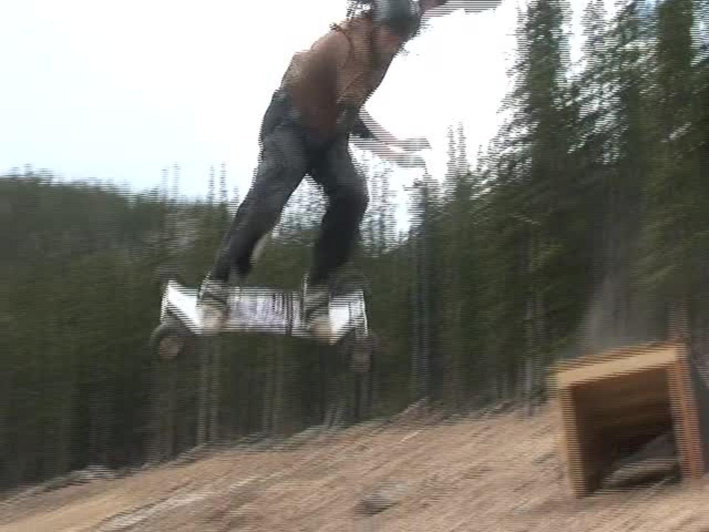 Downhill Mountain Boarder Jumps Ramp and Crashes | Jukin Licensing