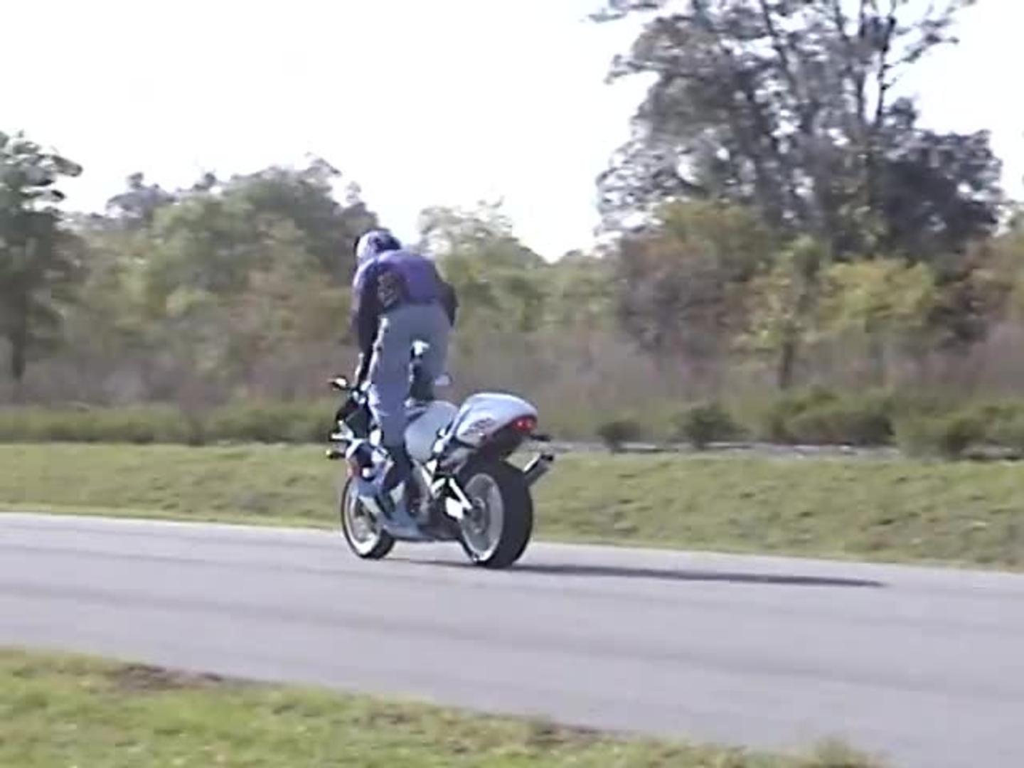 Lady on Motorcycle Has Wardrobe Malfunction | Jukin Media Inc