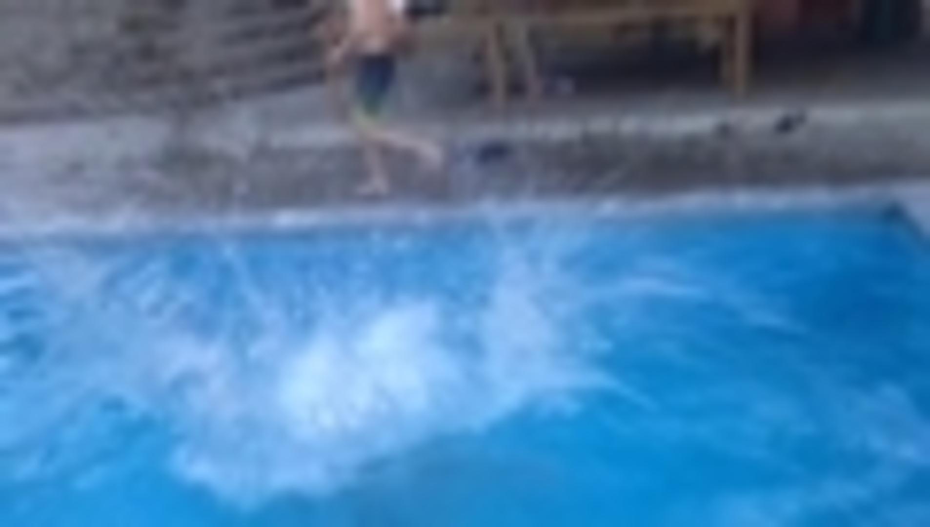 Bikini Girl Jumps Off Roof and Misses Pool | Jukin Media Inc