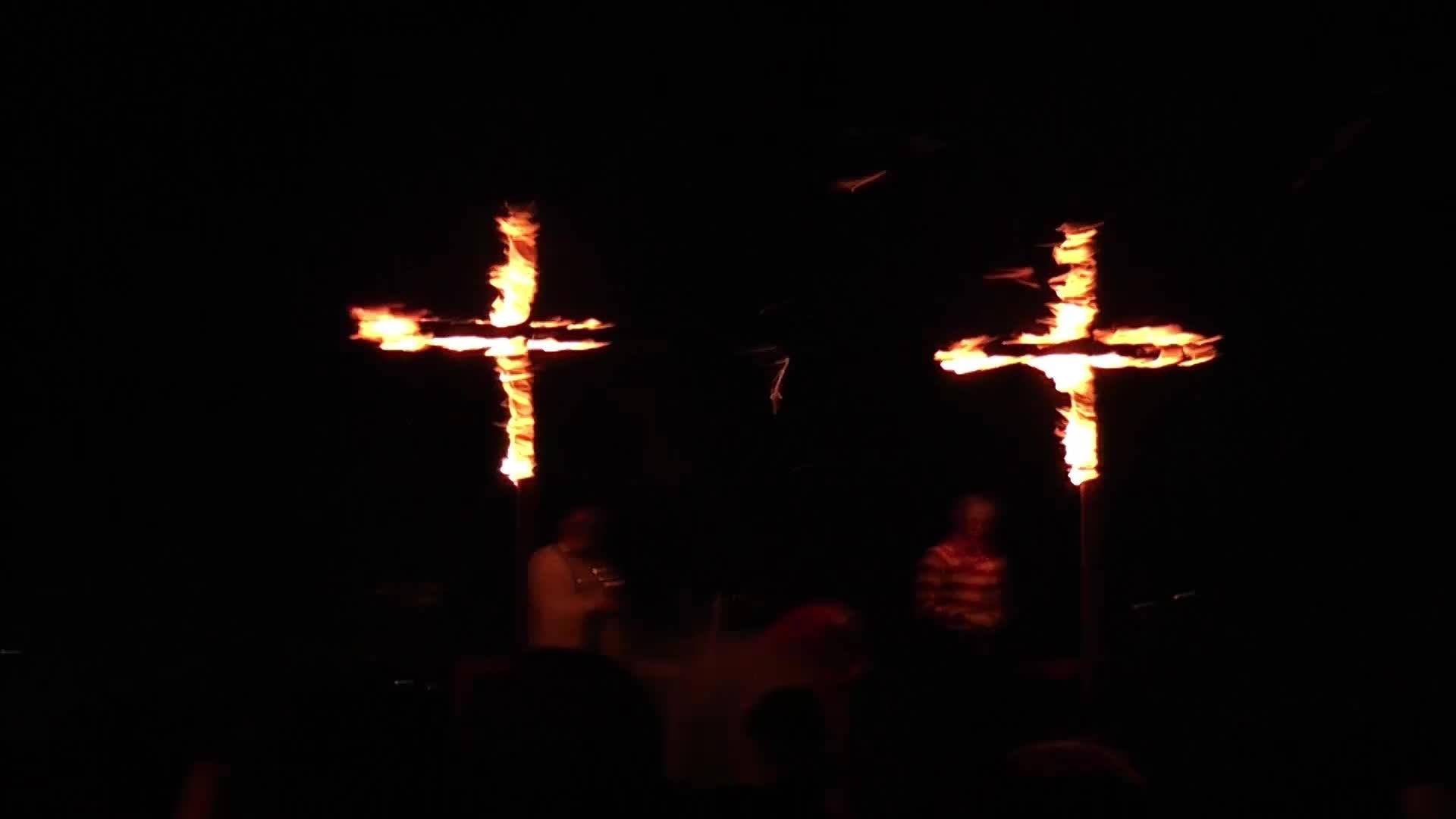 Fireworks Thrown at Men Burning Cross | Jukin Licensing