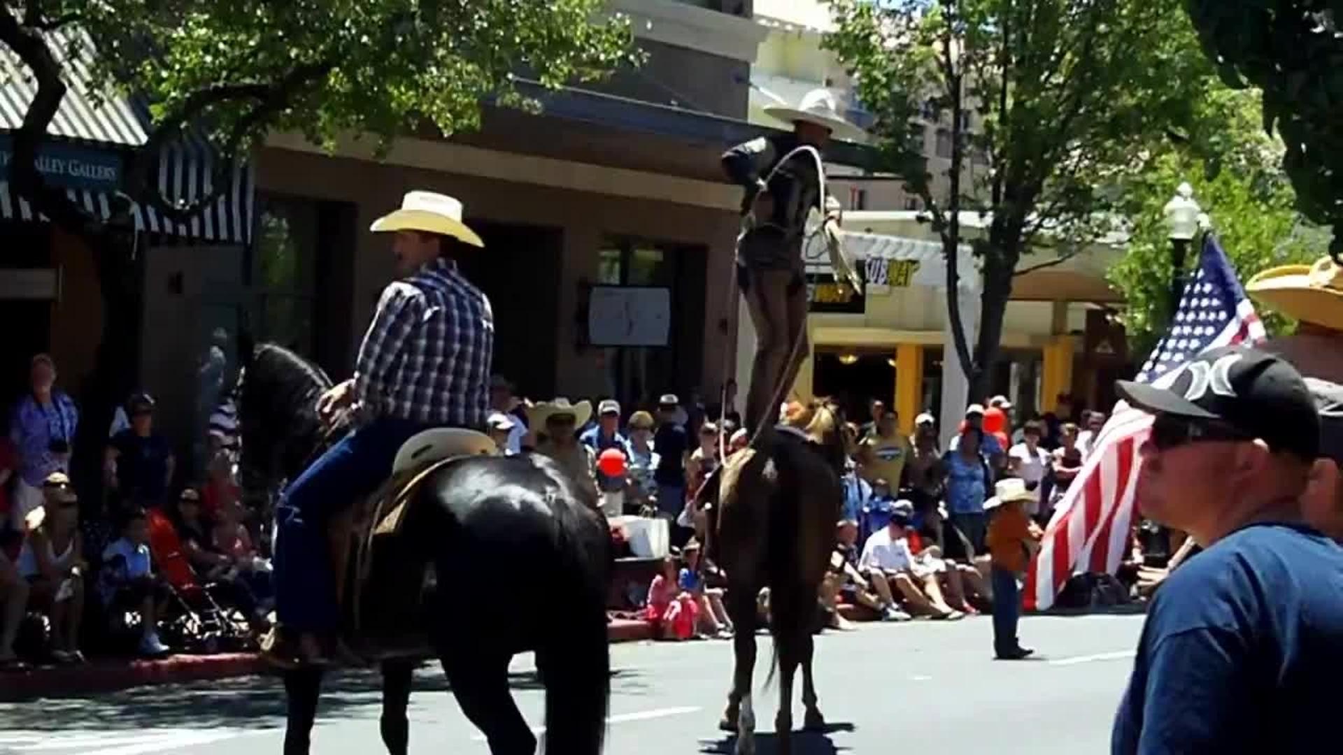 Parade Cowboy Lasso Performance Falls Off Horse | Jukin Licensing