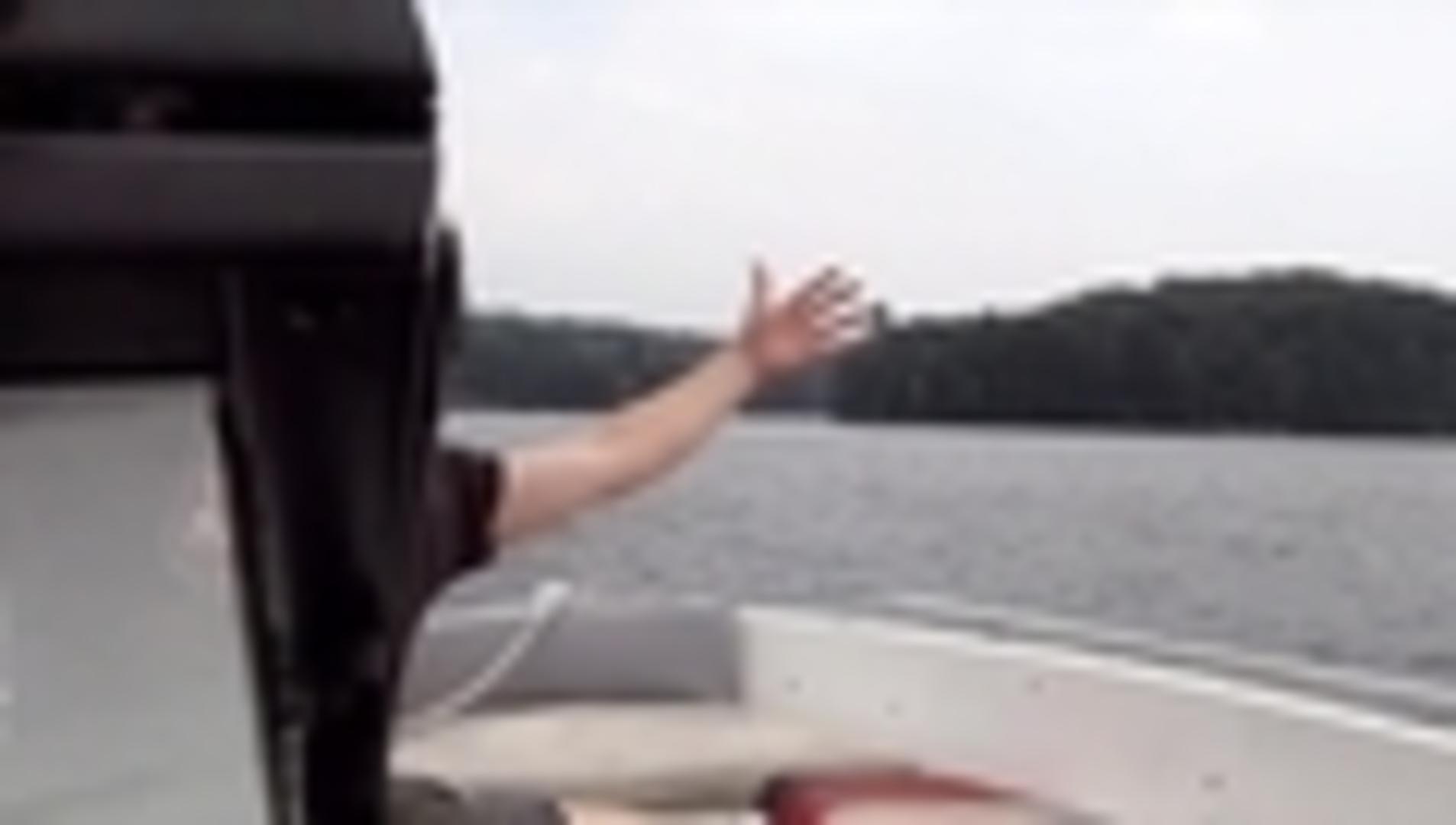 Guys Go Cliff Jumping off 56-Foot Lakefront Drop | Jukin Licensing