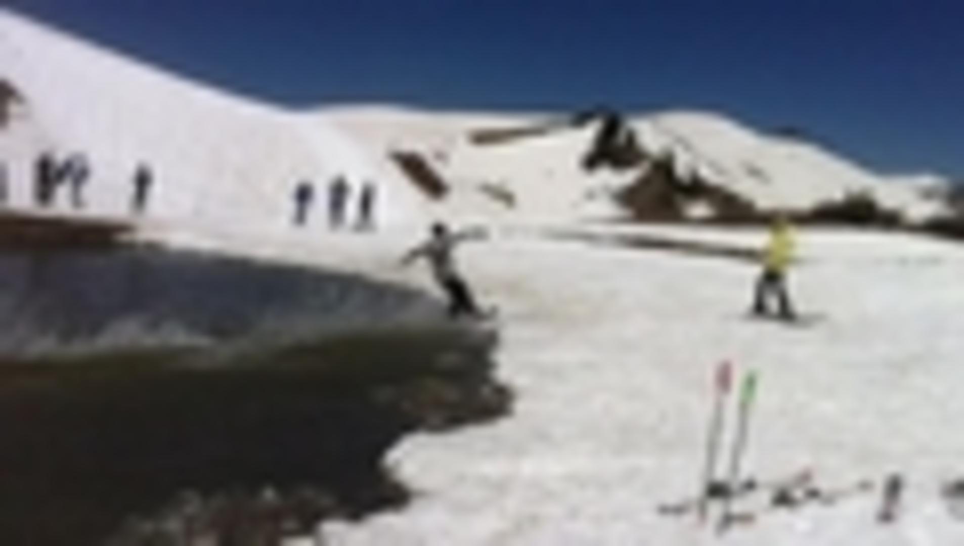 Snowboarder Skims Across Pond with Ease | Jukin Licensing