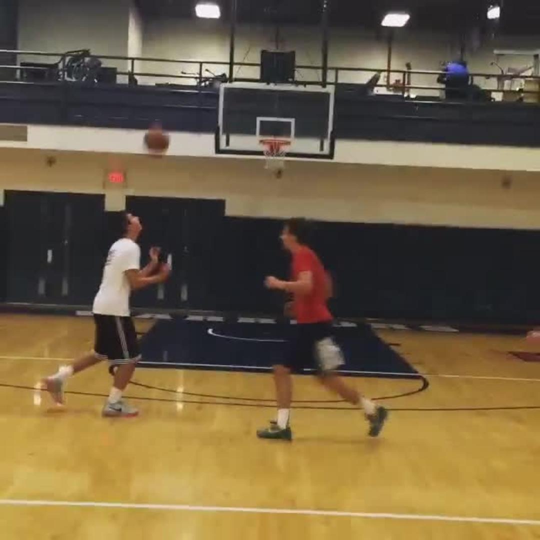 Men in Pool Bounce Soccer Ball into Basketball Hoop | Jukin Media Inc