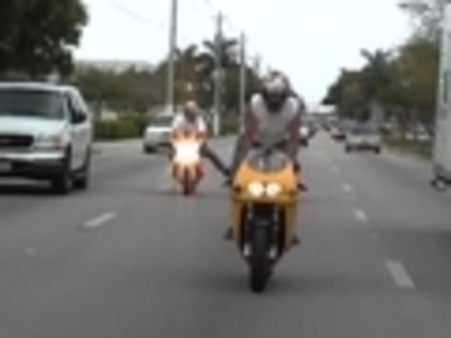 Lady on Motorcycle Has Wardrobe Malfunction | Jukin Media Inc