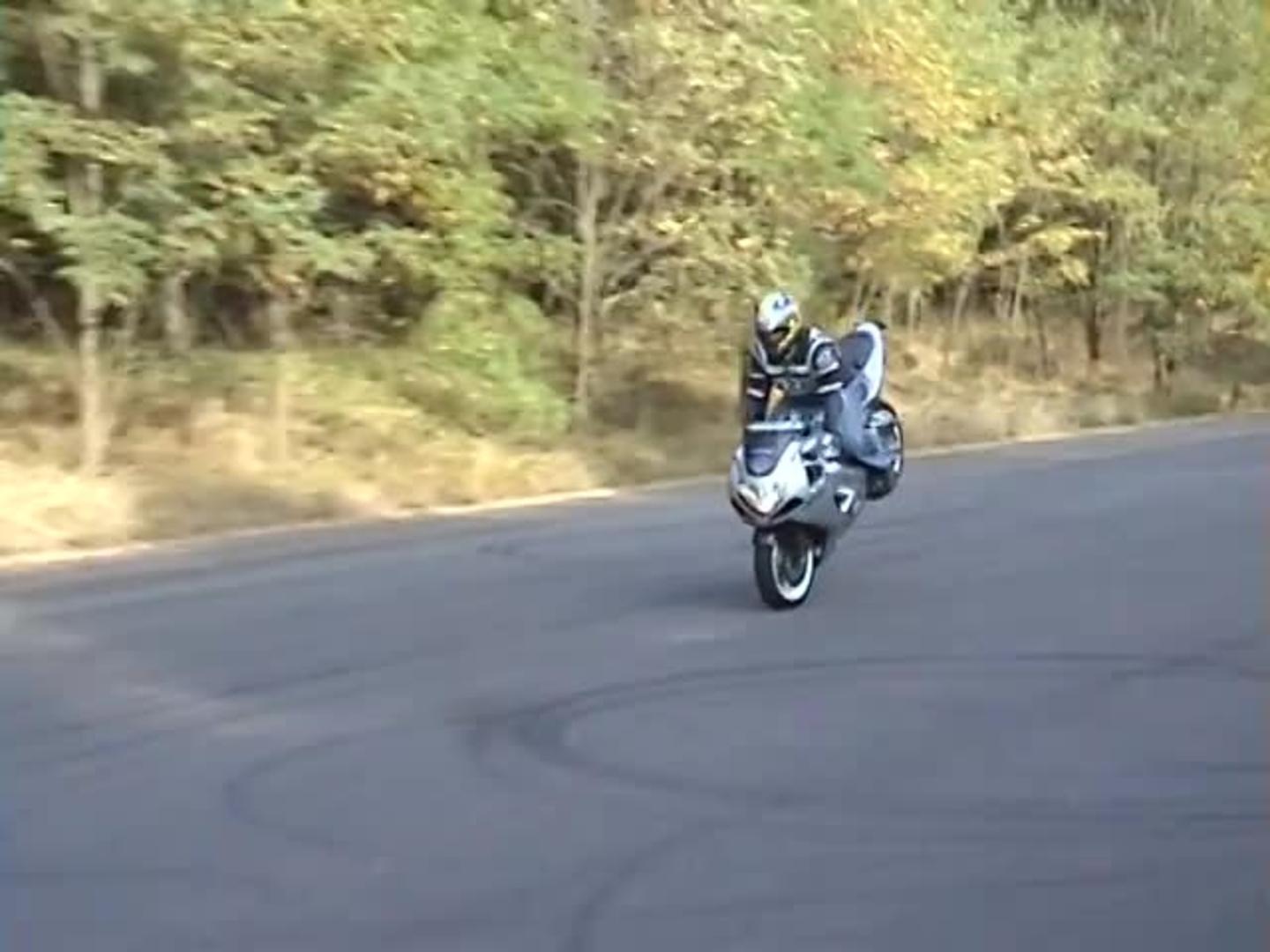 Motorcycle Stoppie Goes Crooked and Tips Over | Jukin Licensing