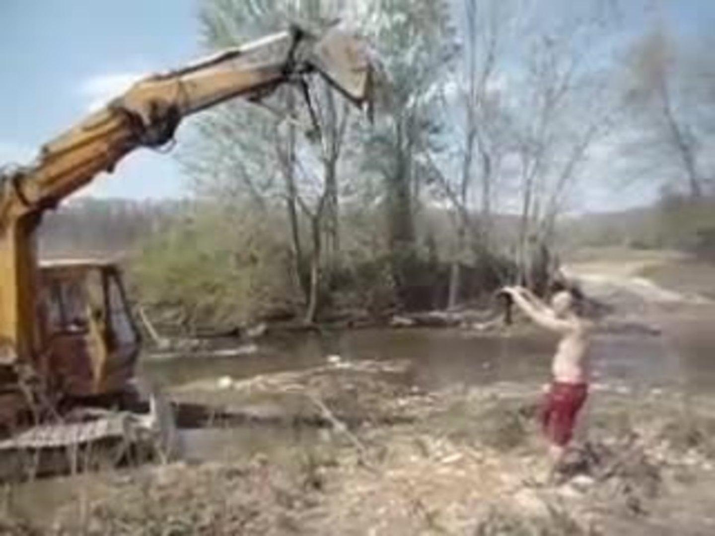 Man on Rope Swing Crashes into Excavator | Jukin Media Inc