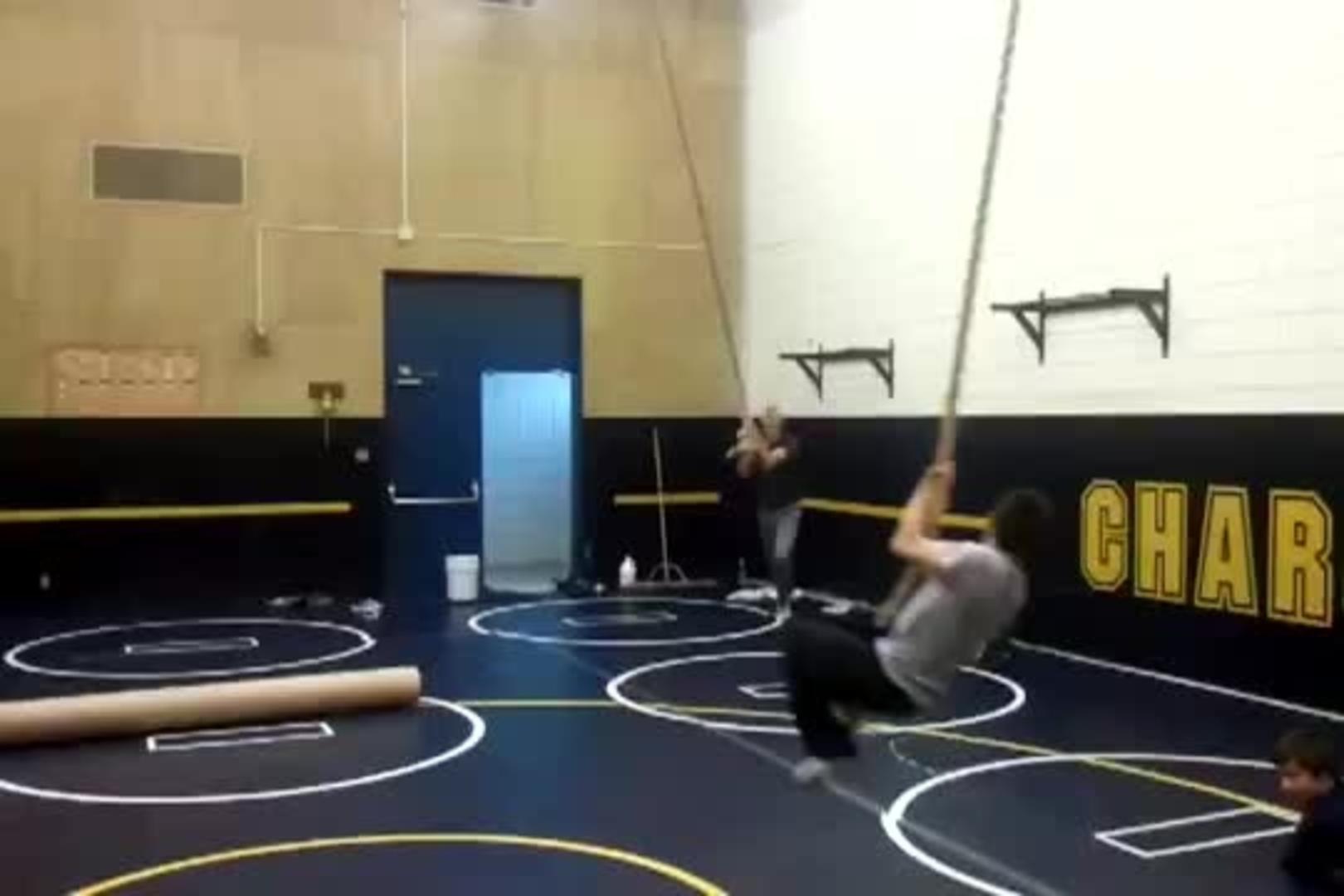 Guy Falls off Rope Swing Inside Gym | Jukin Licensing