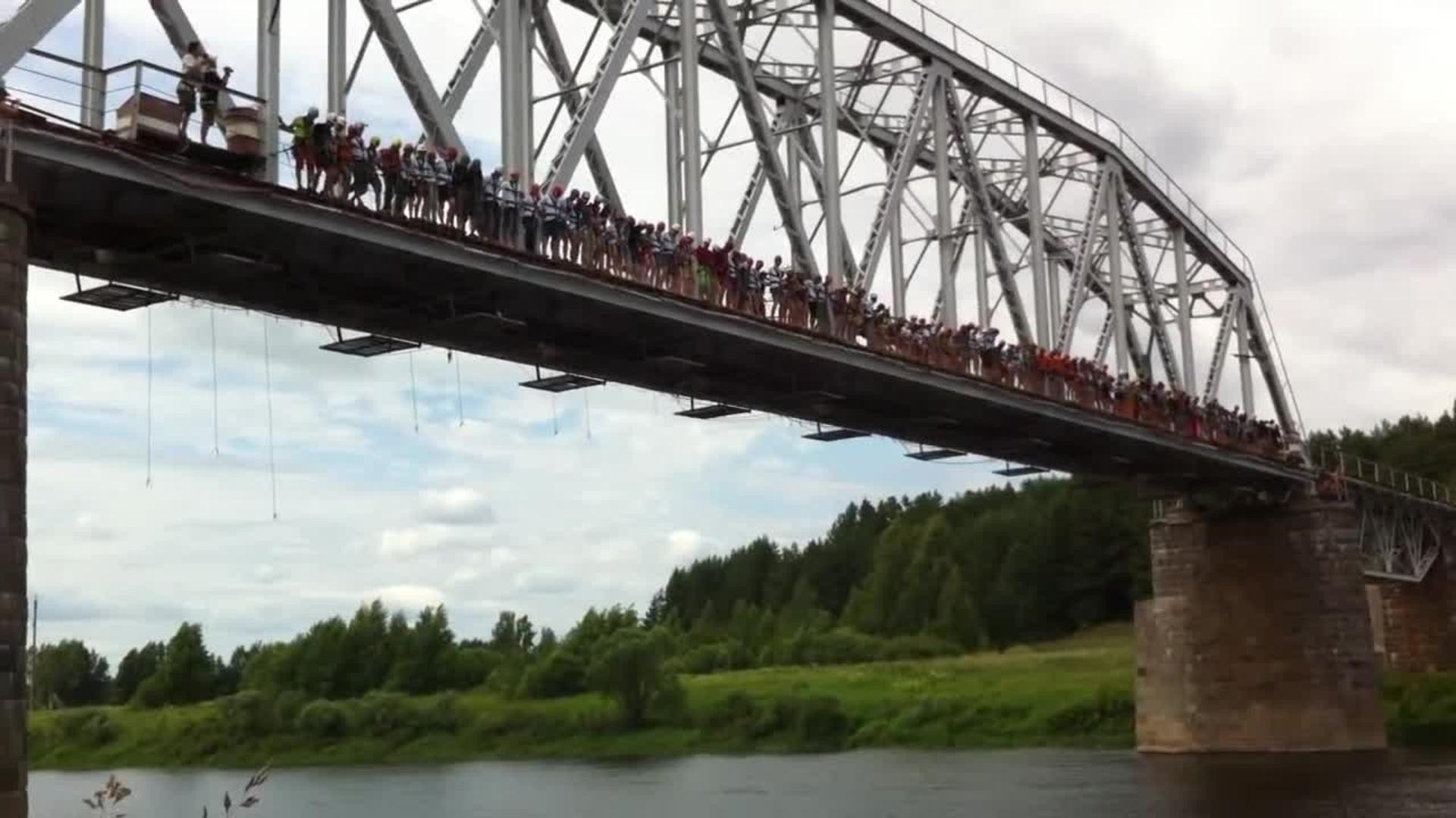 BASE Jump Backflip Off Dam Bridge | Jukin Media Inc