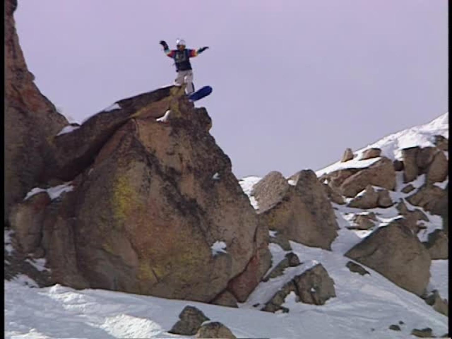 Drop off Snowy Cliff into Frozen Water | Jukin Media Inc