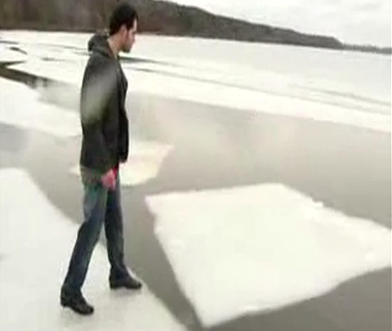 Man Gets Stuck on Floating Piece of Ice | Jukin Media Inc