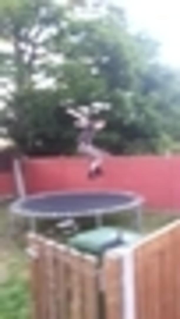 Trampoline Jump Onto Fence Fail | Jukin Licensing