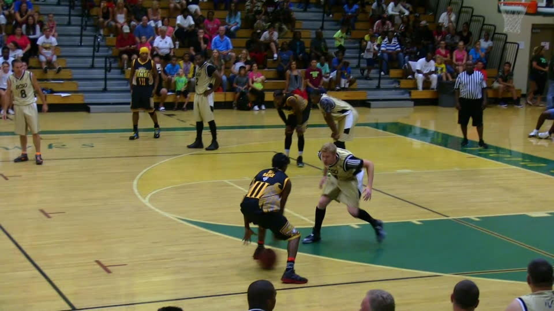 Basketball Forward Tricks Defender for Basket | Jukin Licensing