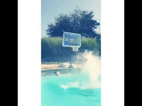 Guy Performs Dunk Tricks over Pool | Jukin Licensing