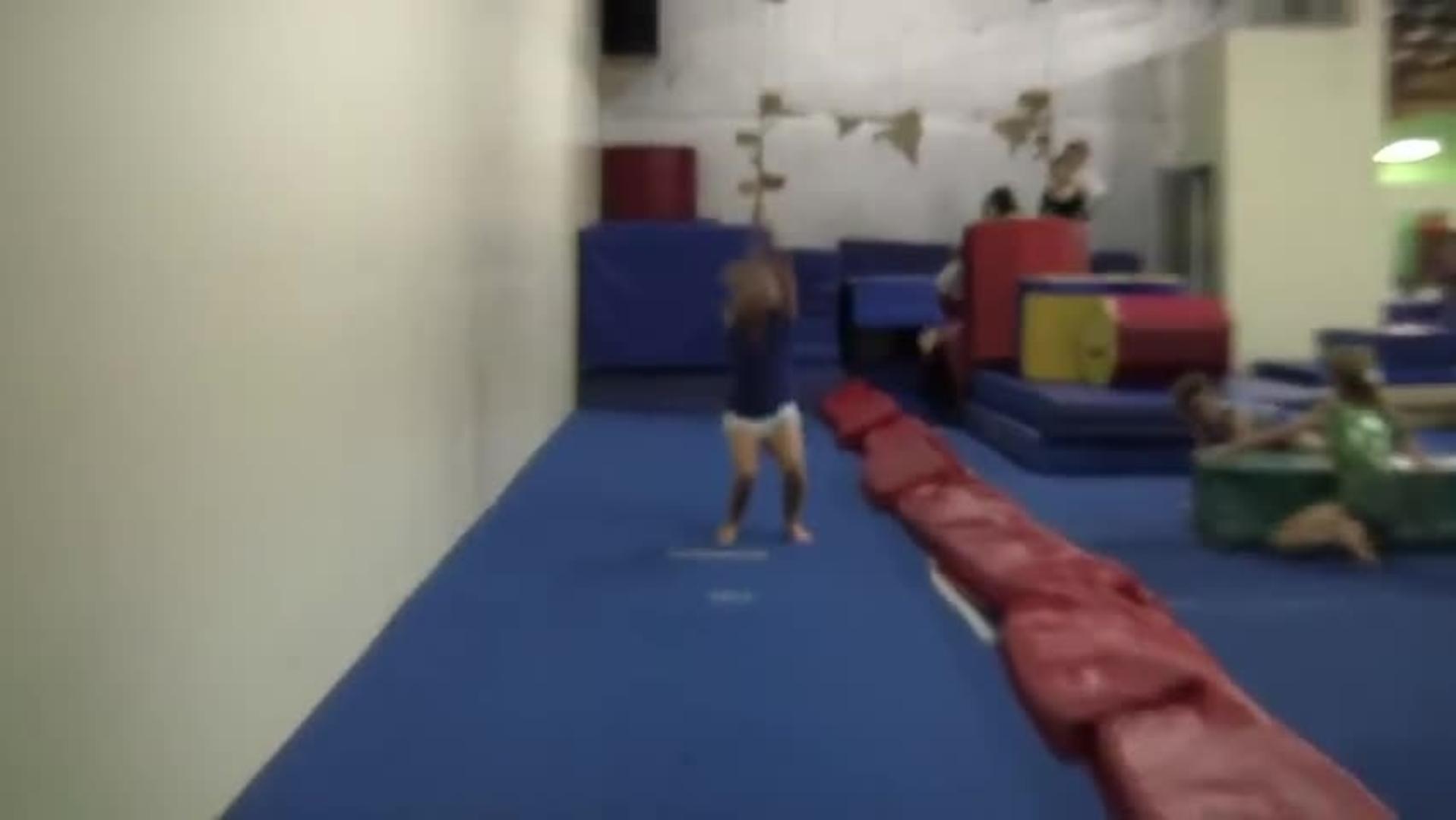 Girl Back Handsprings into Mat | Jukin Licensing