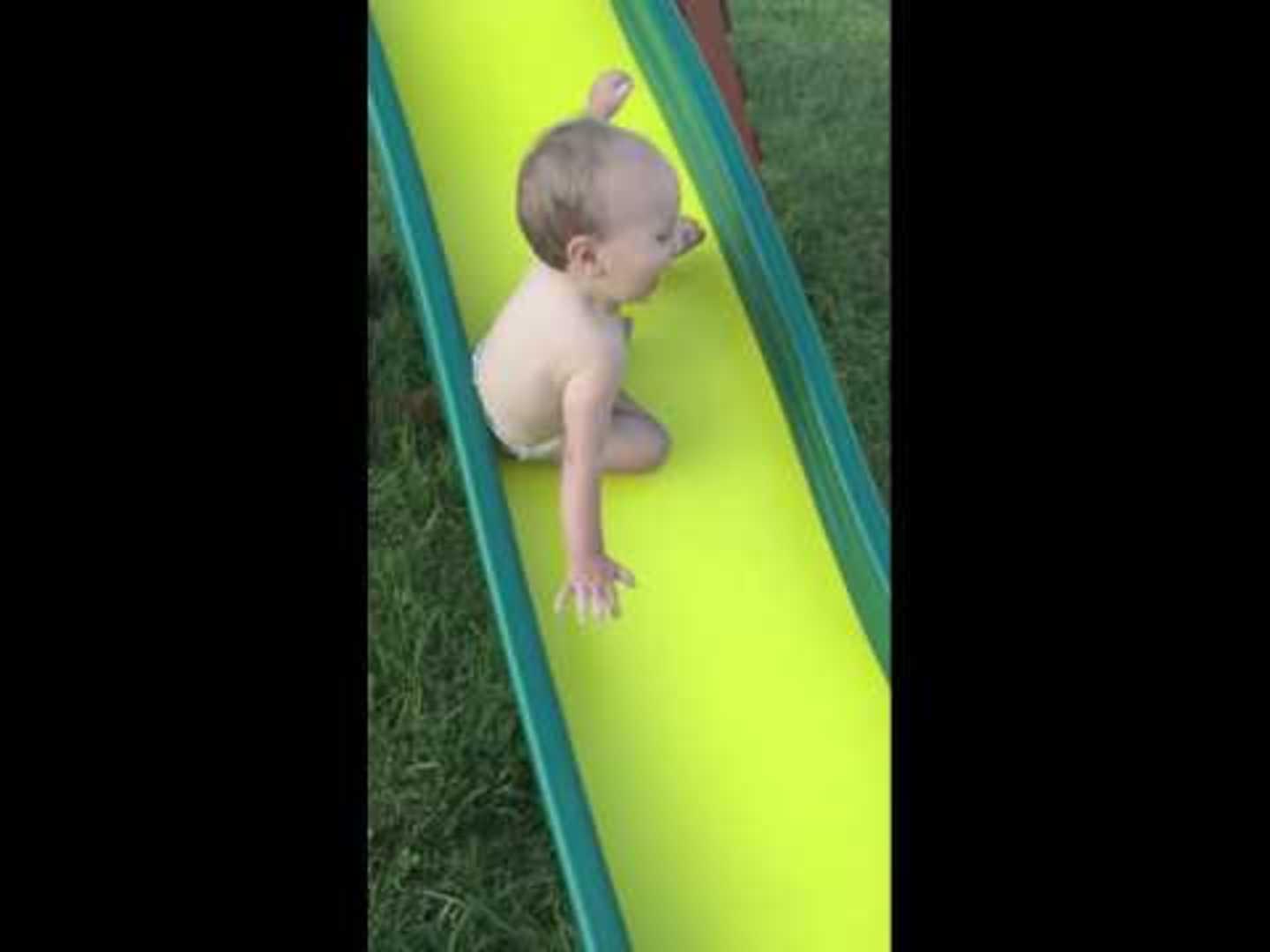Boy Tumbles Down Slide | Jukin Media Inc