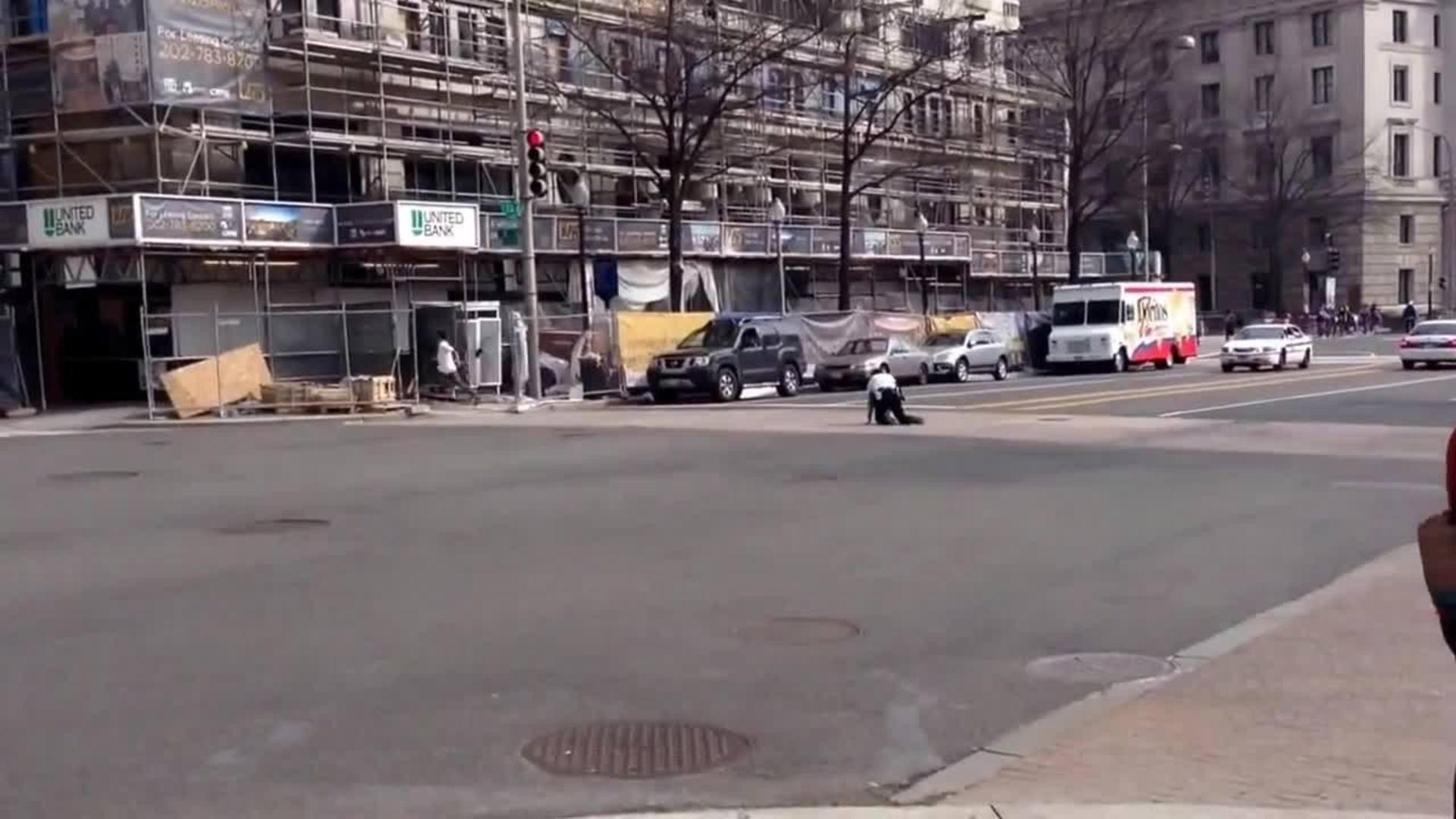 Policeman Falls in Crosswalk Chasing Perp | Jukin Licensing