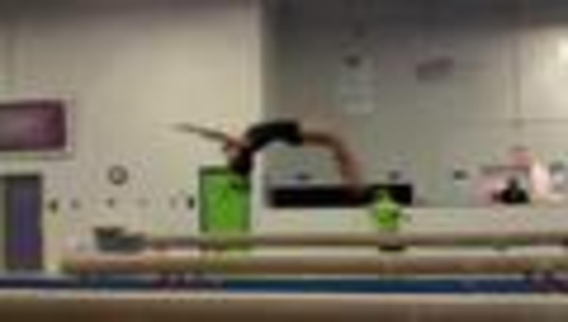 Gymnastics Girl Slips and Falls off Balance Beam | Jukin Media Inc