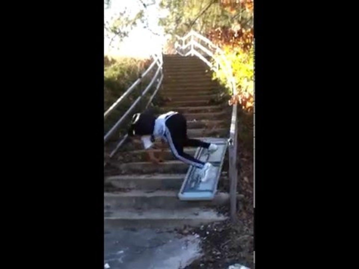 Teens Riding Chair Fall down Stairs | Jukin Media Inc