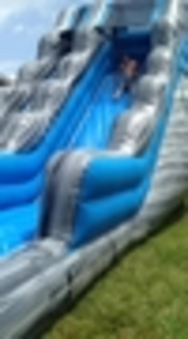 Kid Wipes out at End of Bumpy Water Slide Ride | Jukin Licensing