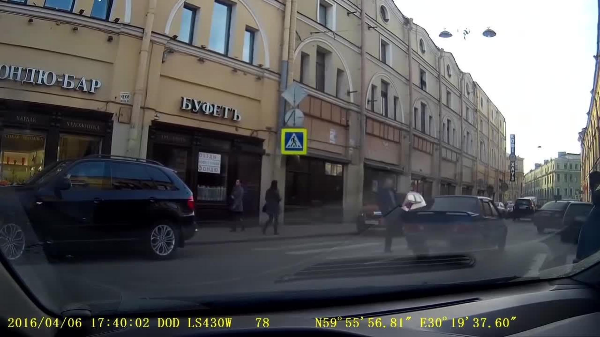 Angry Pedestrian Breaks Car Window | Jukin Licensing