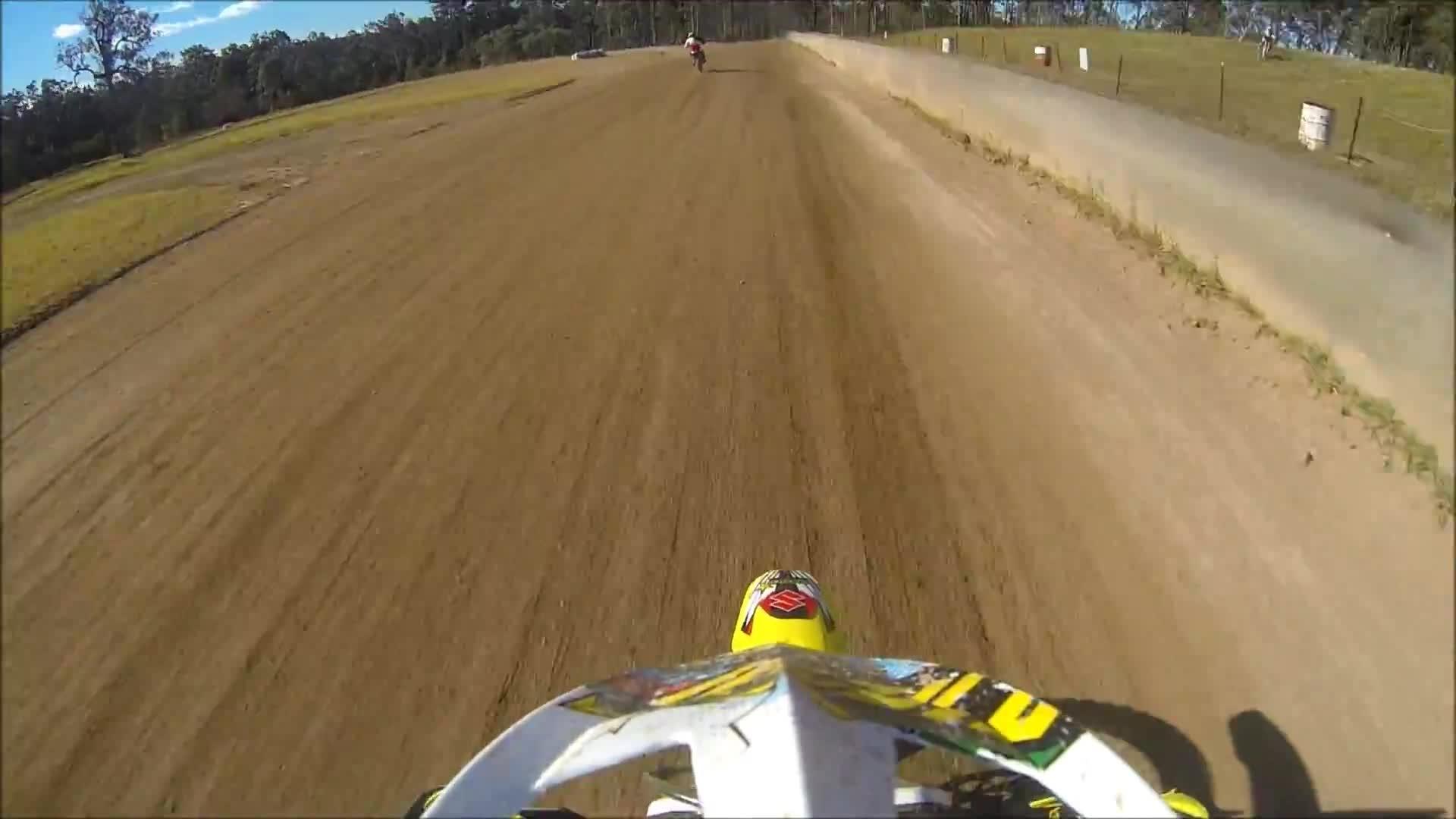 Dirt Biker Slams into Fallen Biker on Track | Jukin Licensing
