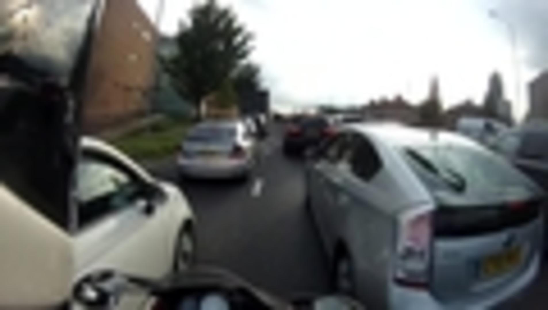 Guy Tries to Get into Car Driving on Highway | Jukin Licensing