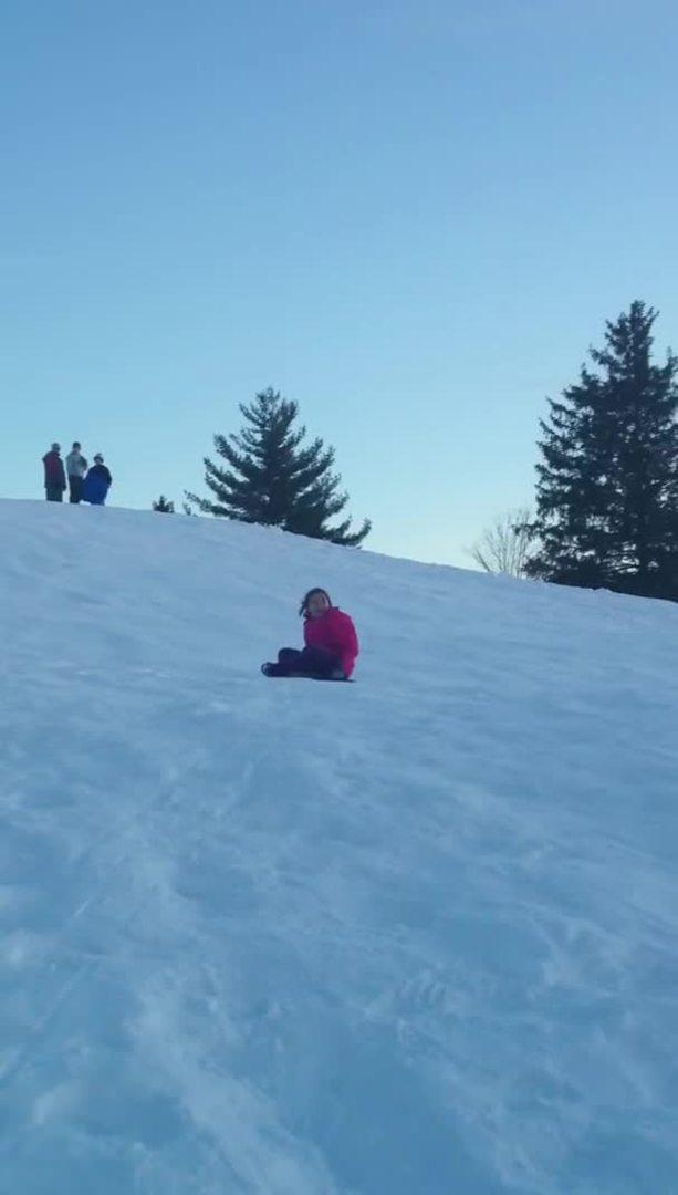 Girl on Sled Flies off Large Snow Ramp | Jukin Licensing