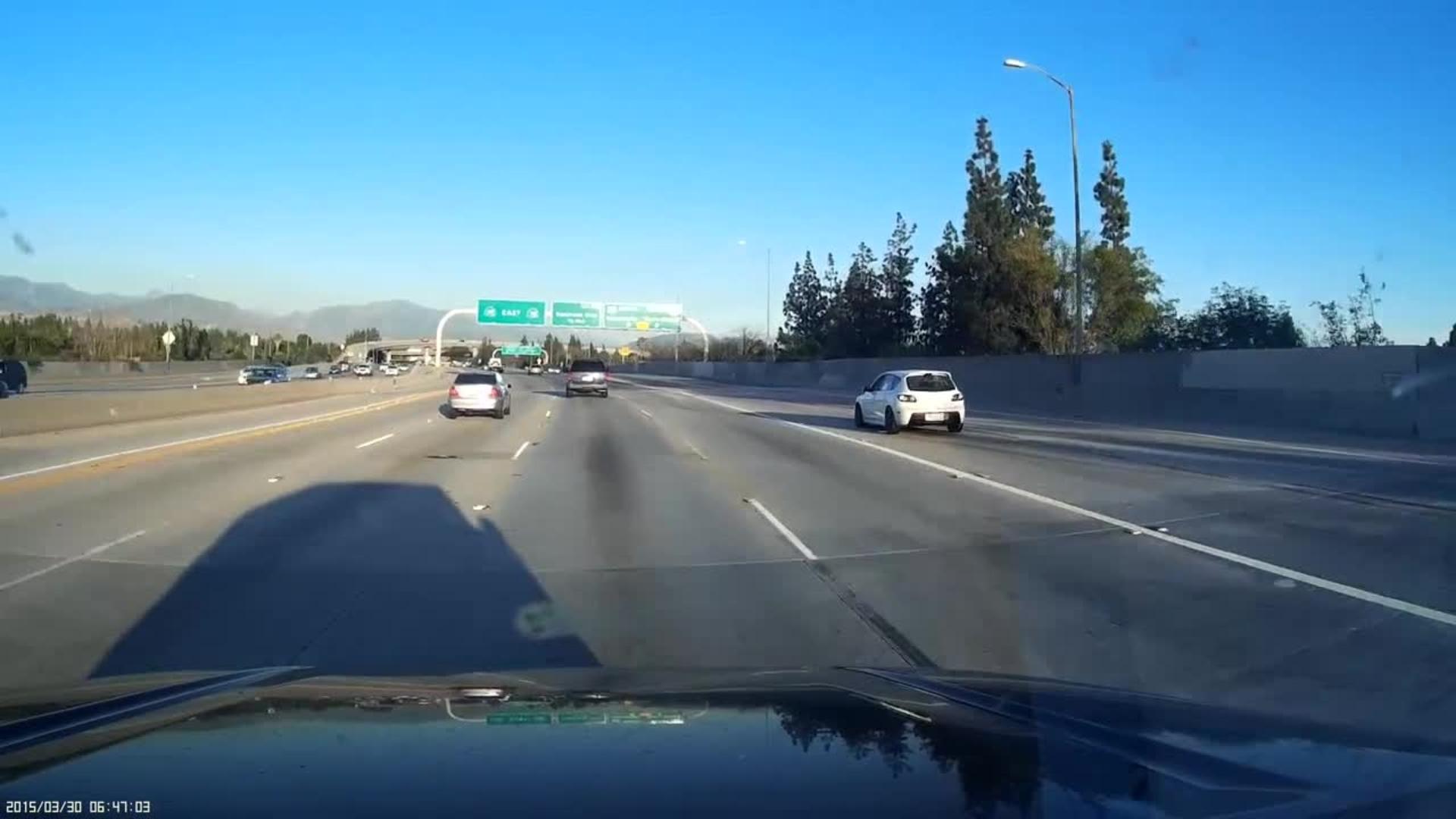Crazy Driver Almost Misses Freeway Exit | Jukin Licensing