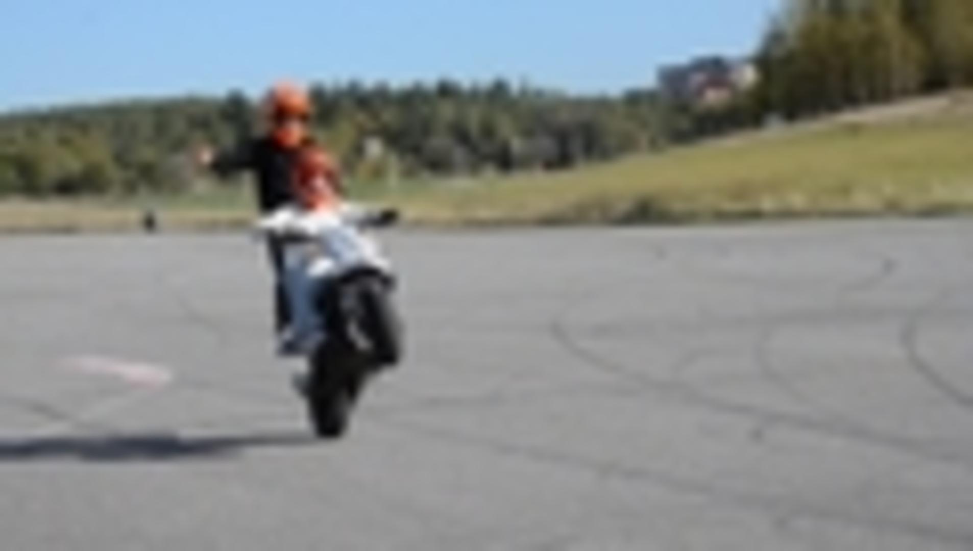 Guy Turns off Friend's Motorcycle at Intersection | Jukin Media Inc