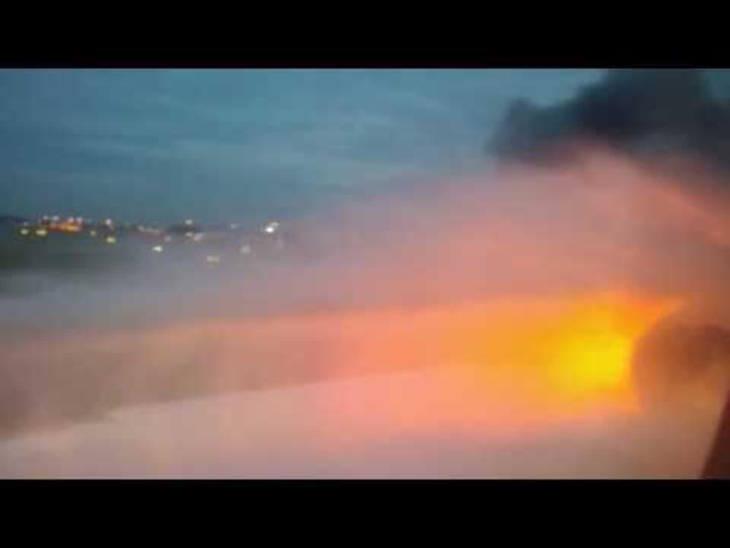 Airplane Engine Bursts into Flames after Making Emergency Landing ...