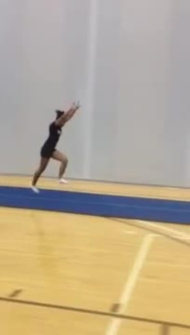 Cheerleader Attempts Some Gymnastics Handsprings | Jukin Licensing