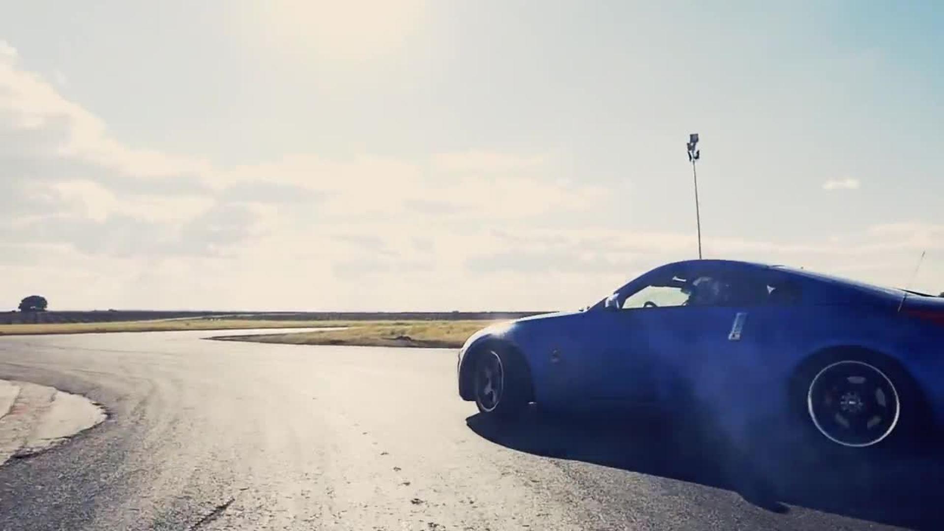 Blue Car Loses Tire during Drift | Jukin Licensing