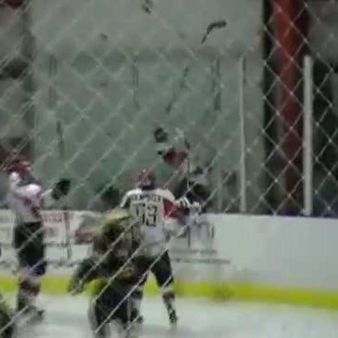 Hockey Player Jumps through Glass | Jukin Licensing