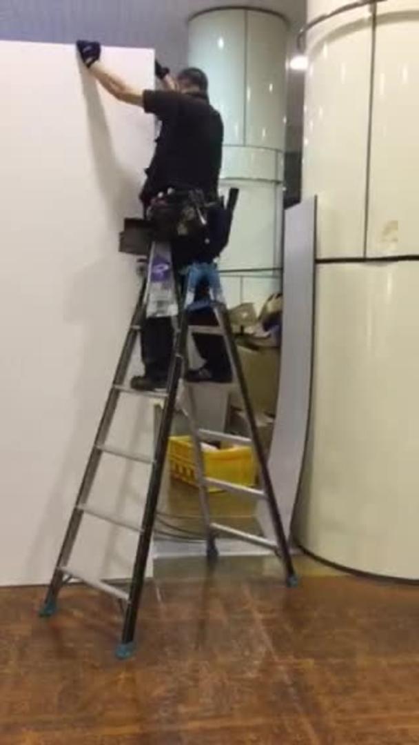 Workman Uses Ladder to Move Around | Jukin Licensing