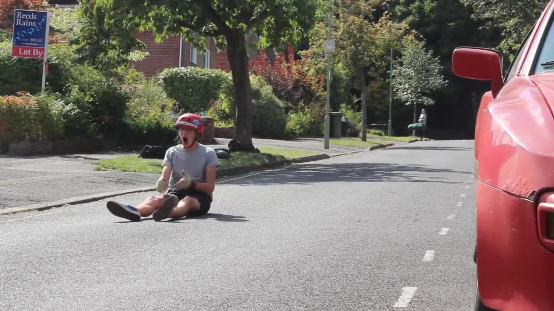 Red Helmet Longboard Stopping Fail | Jukin Licensing