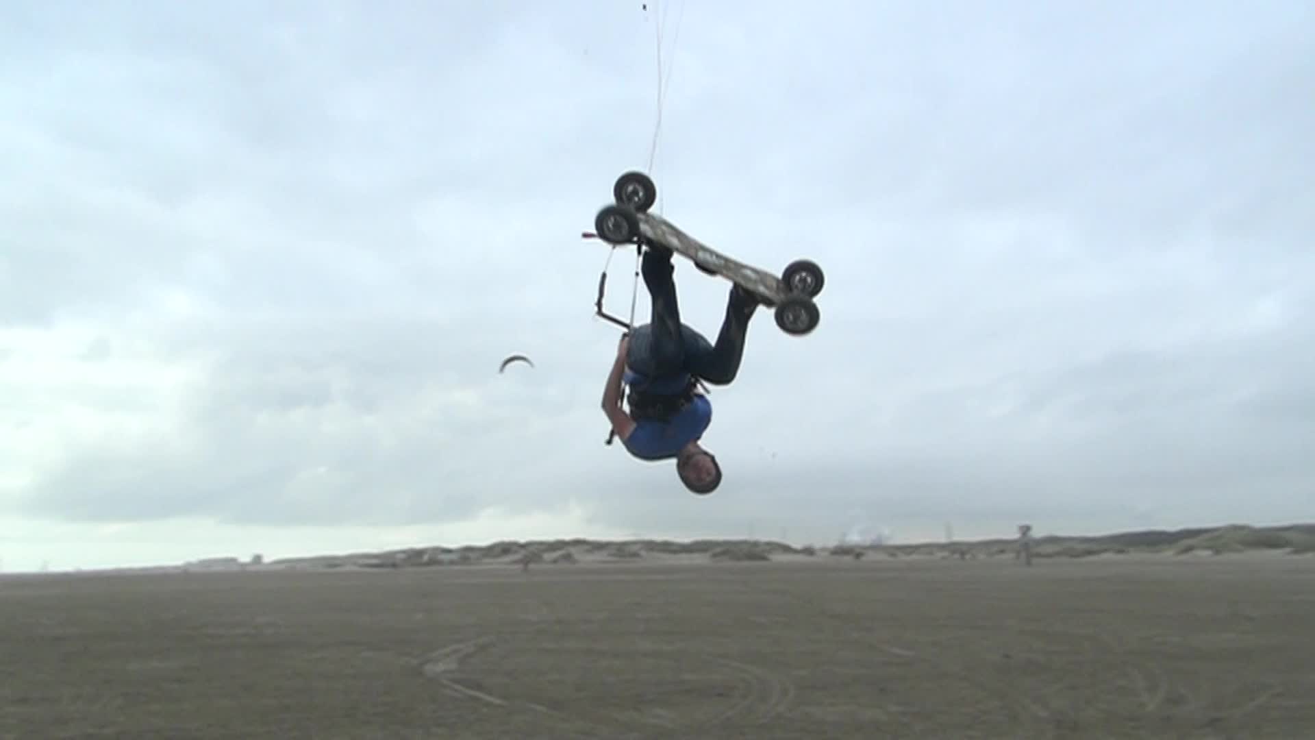 Kiteboarder Performs Slim Chance Trick in Sand | Jukin Licensing