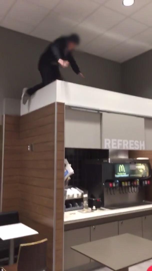 Guy Falls Through Roof at Fast Food Restaurant | Jukin Licensing