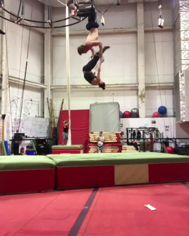 Dynamic Duo Perform Tricks Hanging From Trapeze | Jukin Licensing
