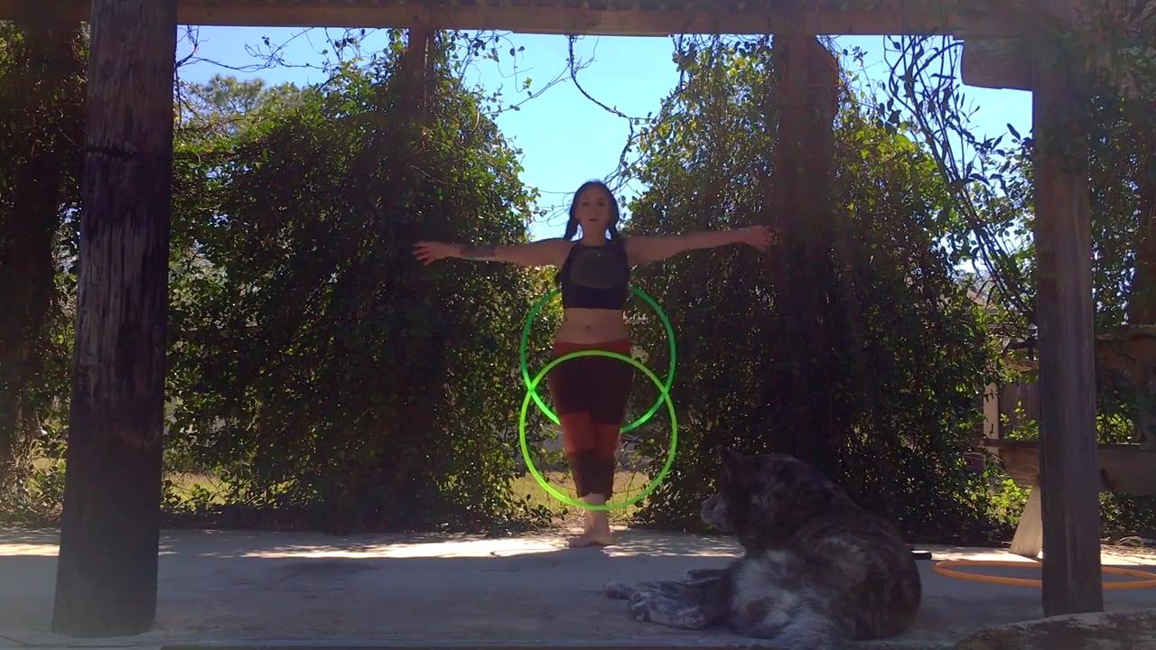 Girl Uses Two Hula Hoops to Perform Tricks | Jukin Media Inc