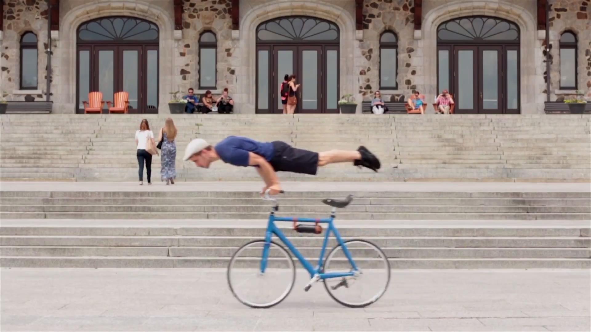 Man Carries Fridge While Riding Bike | Jukin Media Inc