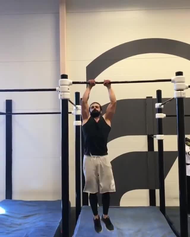 Guy Does Acrobatic Movements on Handlebars | Jukin Media Inc