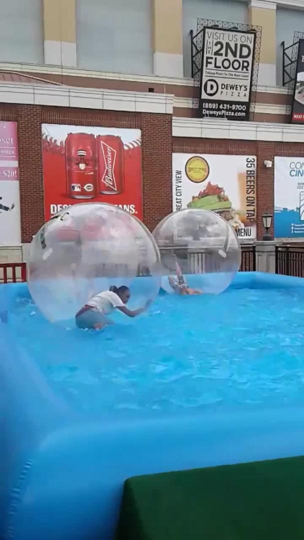 Woman Floats Inside Inflatable Ball in Pool | Jukin Licensing
