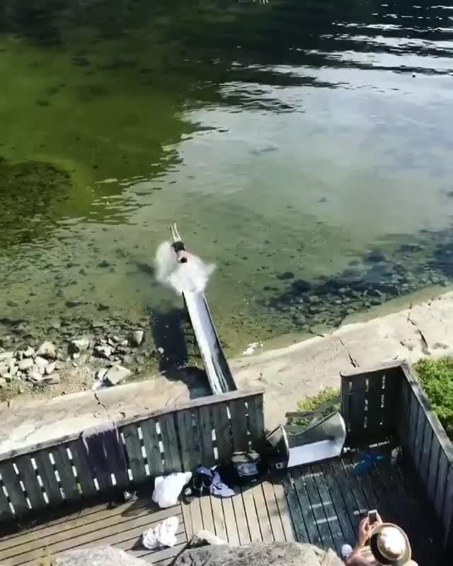 Man Jumps Off Cliff and Onto Slide | Jukin Licensing