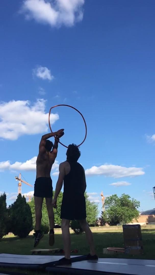 Guy Balances Hoop on Nose as Guy Flips Through it | Jukin Licensing