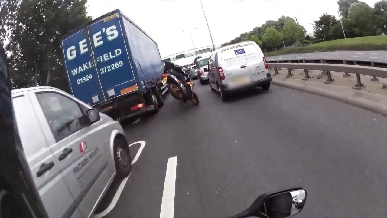 Car Changing Lanes Causes Motorcycle Accident | Jukin Licensing