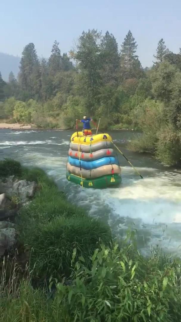 Guy Rides River Rapids on Stacked Rafts | Jukin Media Inc