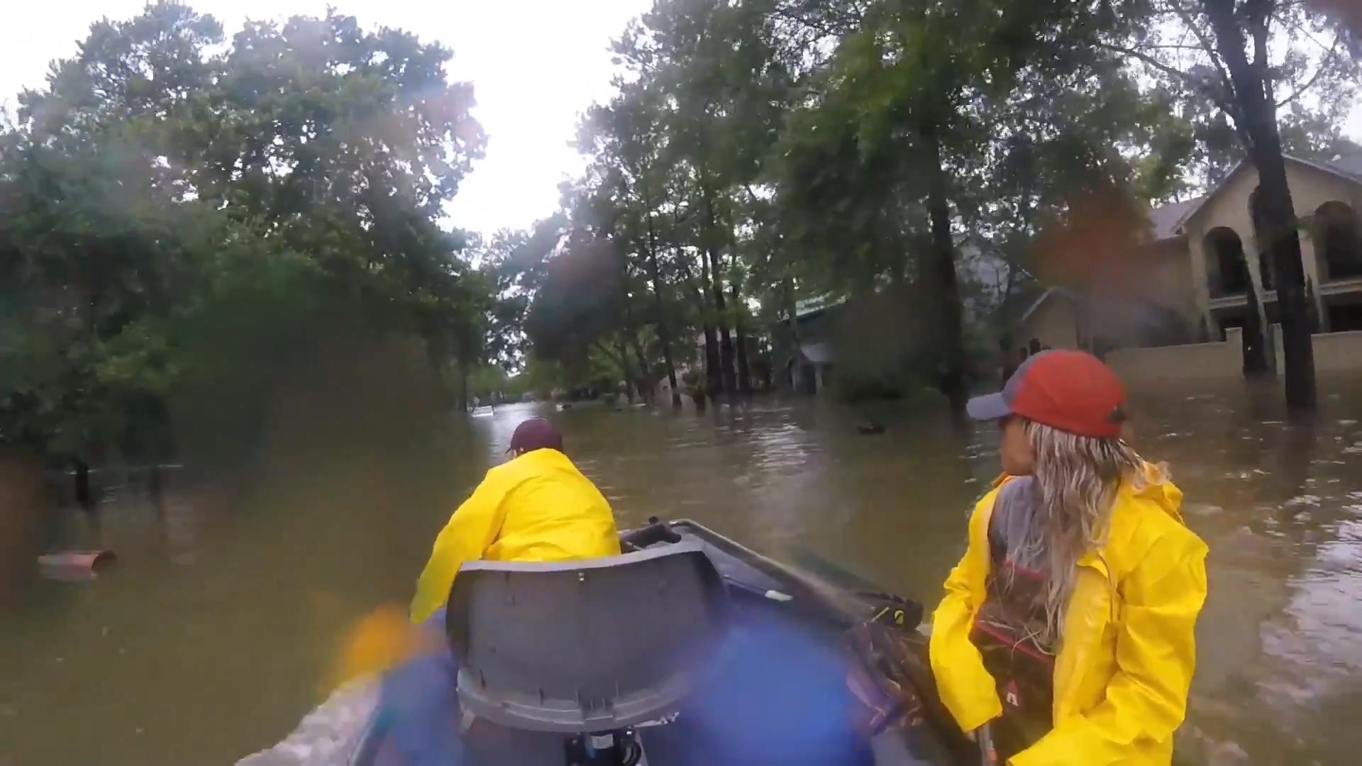 Guy Evacuated By Boat From Flooded Neighborhood | Jukin Licensing