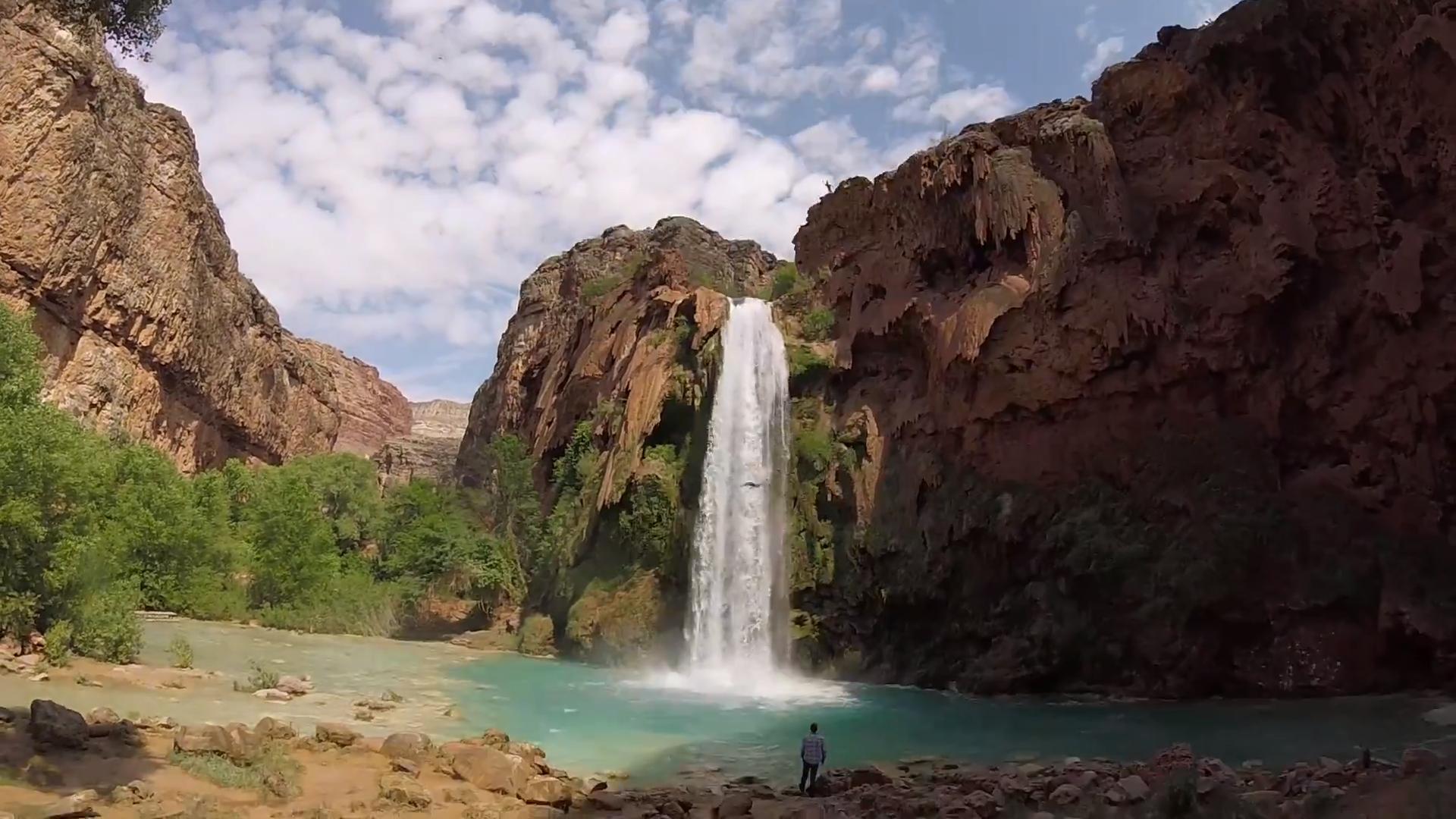 Guy Performs High Dive Off Waterfall | Jukin Licensing